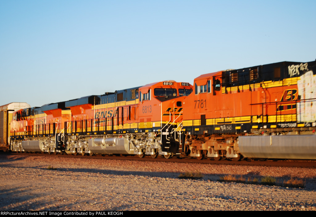 BNSF 6813 and Her Sister BNSF 6816 roll east into the BNSF Barstow yard as #4 and #5 units on a ...